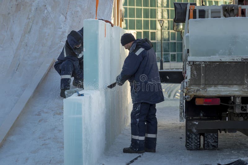 Workers are Assembling Ice Blocks on the Frame of a Wooden Slide Stock ...