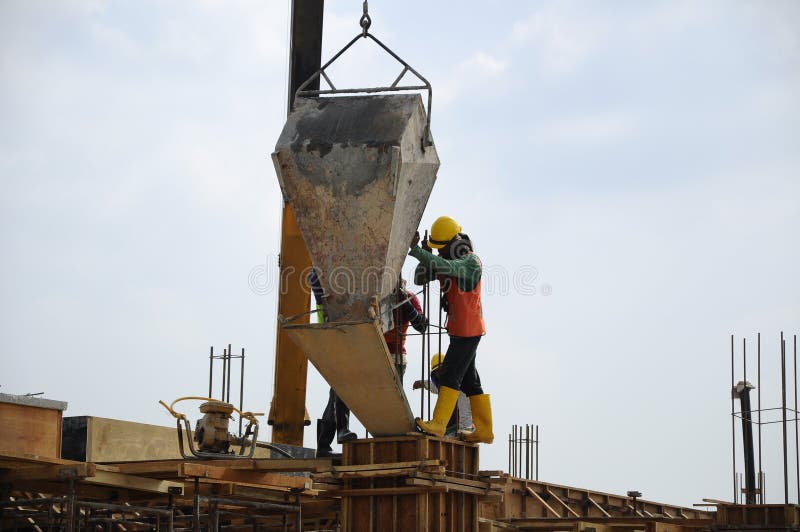 Two Workers Doing Column Concreting Work Editorial Stock Image - Image ...