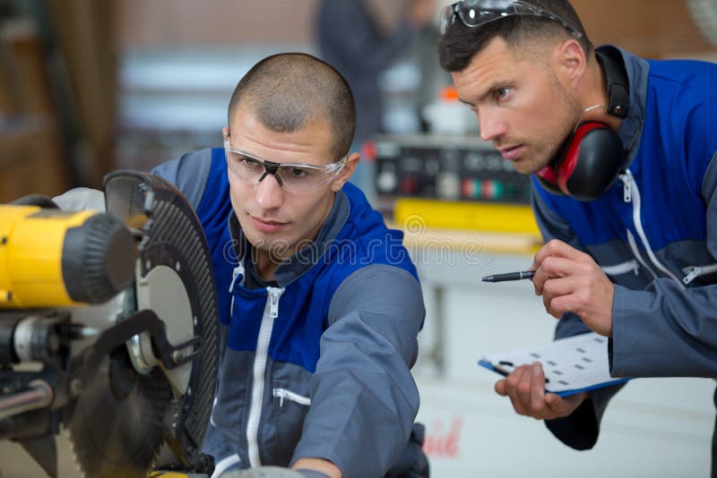 Two Workers during Engine Intervention Stock Photo - Image of arguing ...