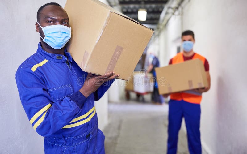Two Workers with Face Masks Carry Cardboard Boxes Stock Photo - Image ...