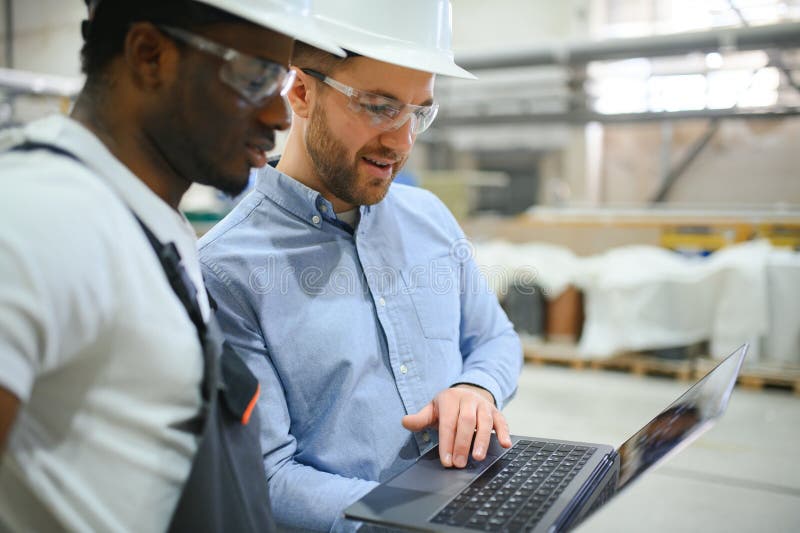 Two Workers at the Factory. Engineer and Worker Stock Image - Image of ...