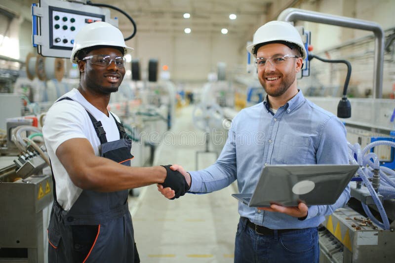 Two Workers at the Factory. Engineer and Worker Stock Photo - Image of ...