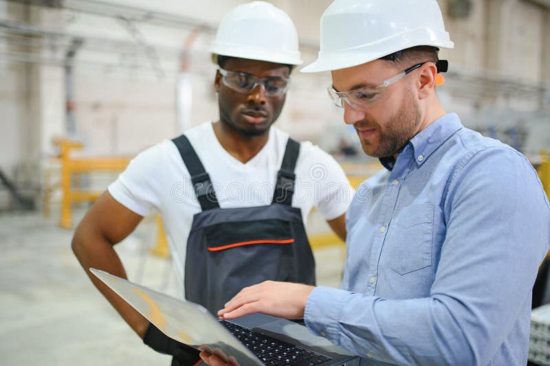 Two Workers at the Factory. Engineer and Worker Stock Image - Image of ...