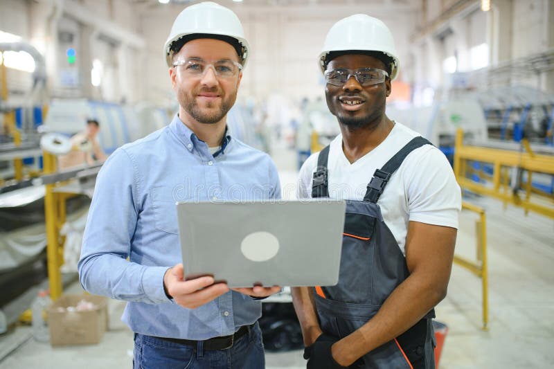 Two Workers at the Factory. Engineer and Worker Stock Image - Image of ...