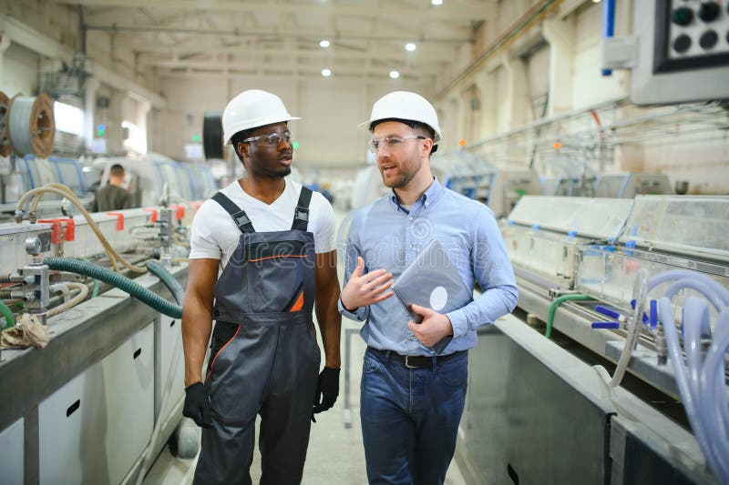 Two Workers at the Factory. Engineer and Worker Stock Image - Image of ...