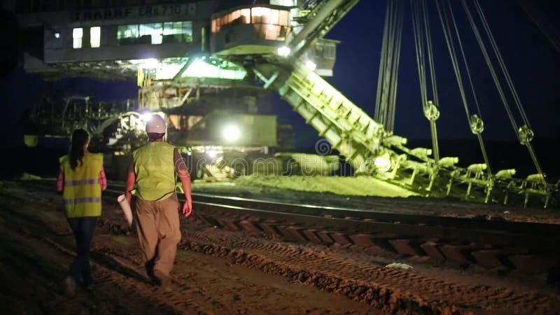 Two Workers are Going Across the Sand Career Stock Video - Video of ...