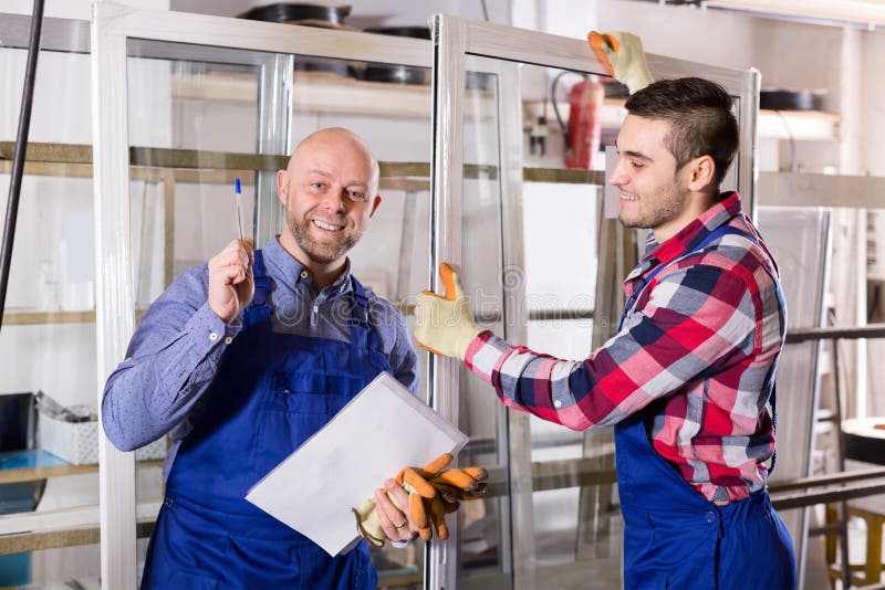 Two Workers Inspecting Windows Stock Image - Image of house, brigade ...
