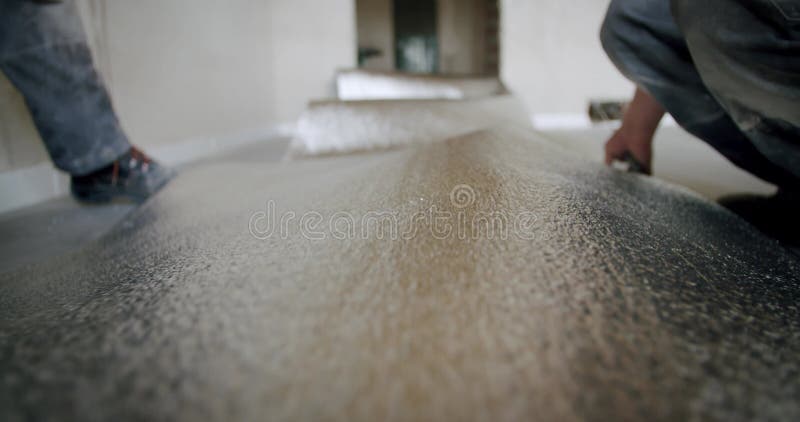 Floor Repair, Liquid Mixture, Leveling Flooring. Construction Workers ...