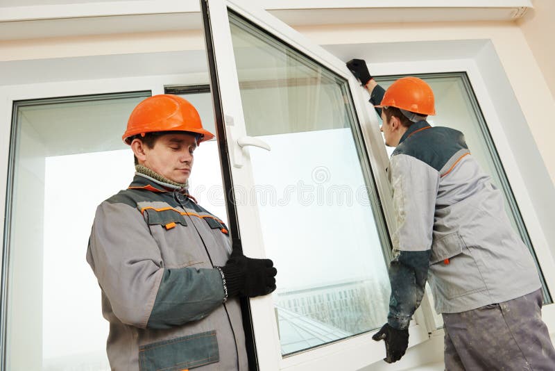 Workers Installing Glass Window on Building Stock Photo - Image of ...