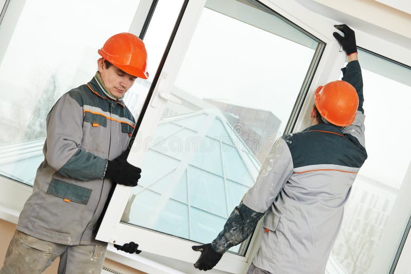 Two Workers Installing Window Stock Photo - Image of handle, person ...