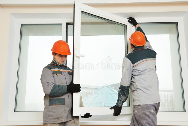 Workers Installing Glass Window on Building Stock Photo - Image of ...