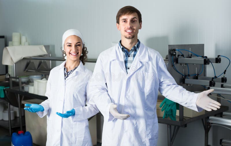 Two Workers in Lab Coats at Dairy Production Stock Image - Image of ...