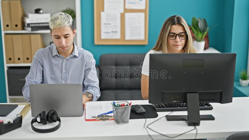 Two Workers Man and Woman Working Together at the Office Stock Image ...