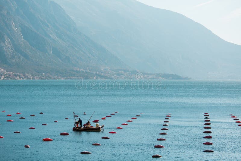 Two Workers of Mussel and Fish Farm Stock Image - Image of color ...