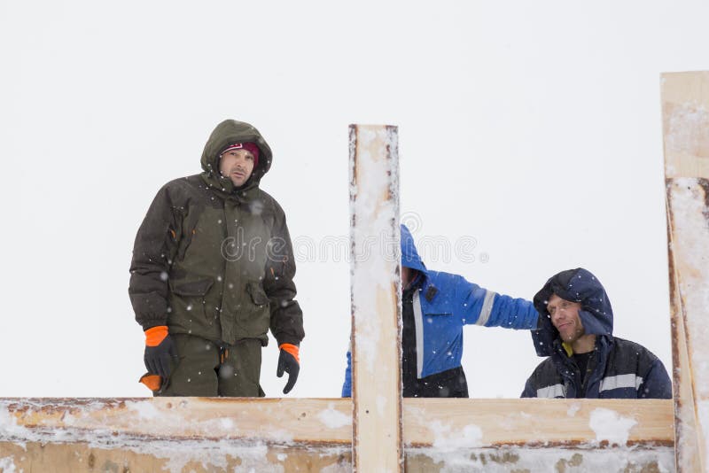Two Workers in Overalls at a Construction Site Stock Photo - Image of ...