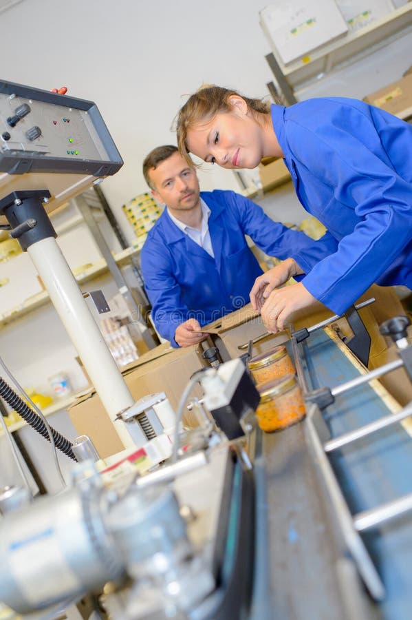 Two Workers on Production Line Stock Photo - Image of woman, cardboard ...