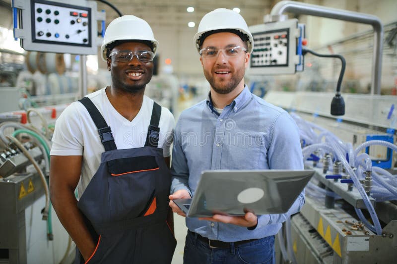 Two Workers in Production Plant As Team Discussing, Industrial Scene in ...