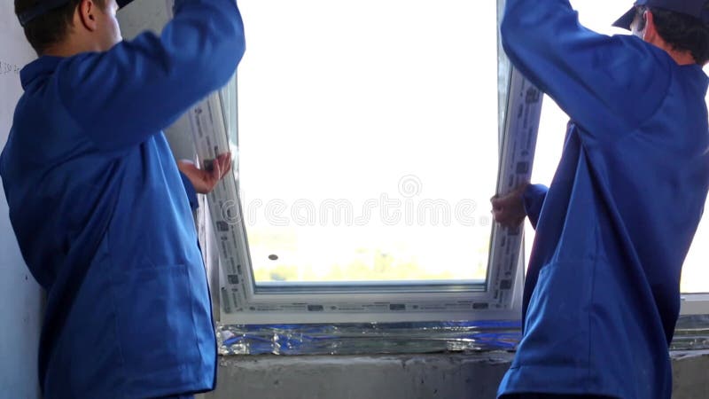 Two Workers Set Window To New Installed Stock Footage - Video of carry ...