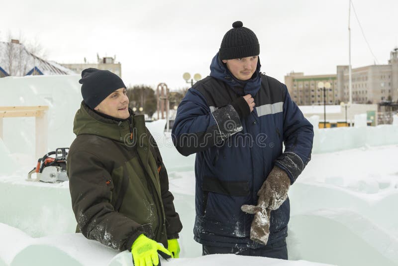 Two Workers at the Site of the Ice Camp Stock Photo - Image of frozen ...