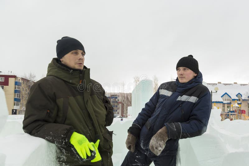Two Workers at the Site of the Ice Camp Stock Photo - Image of ...