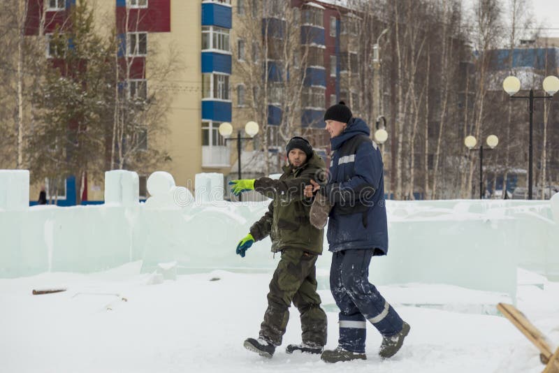 Two Workers at the Site of the Ice Camp Stock Image - Image of panel ...