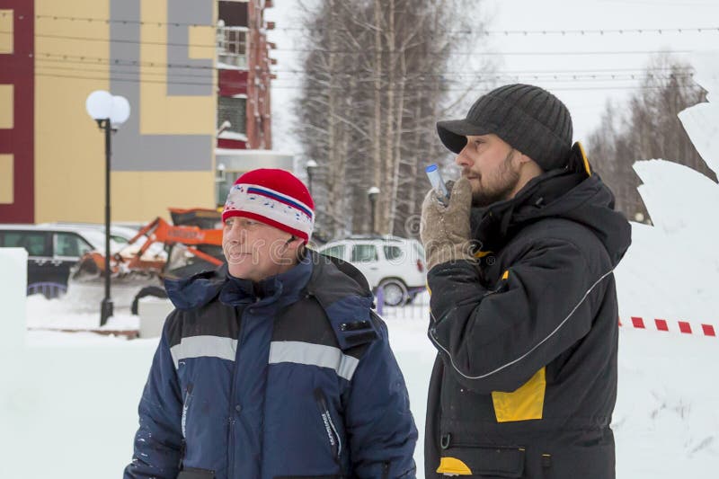 Two Workers at the Site of the Ice Camp Stock Photo - Image of ...