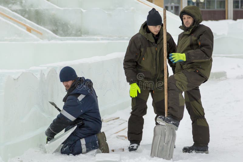 Two Workers at the Site of the Ice Camp Stock Photo - Image of builders ...