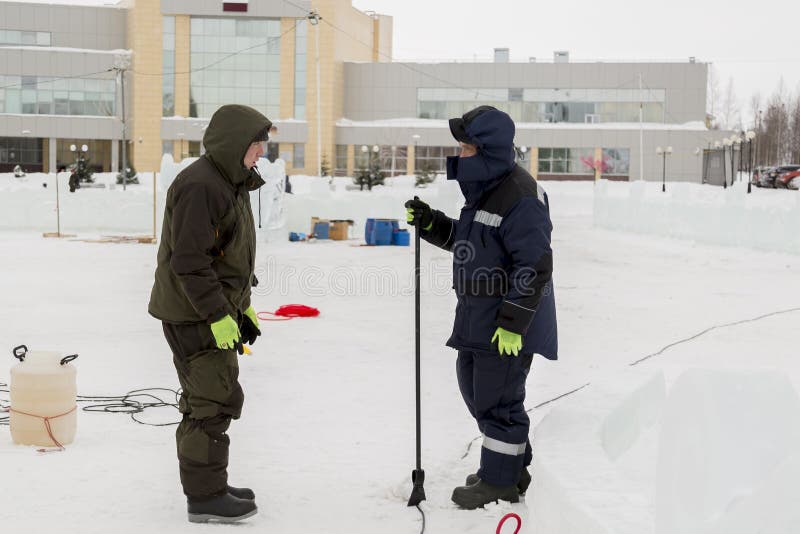 Two Workers at the Site of the Ice Camp Stock Photo - Image of cold ...