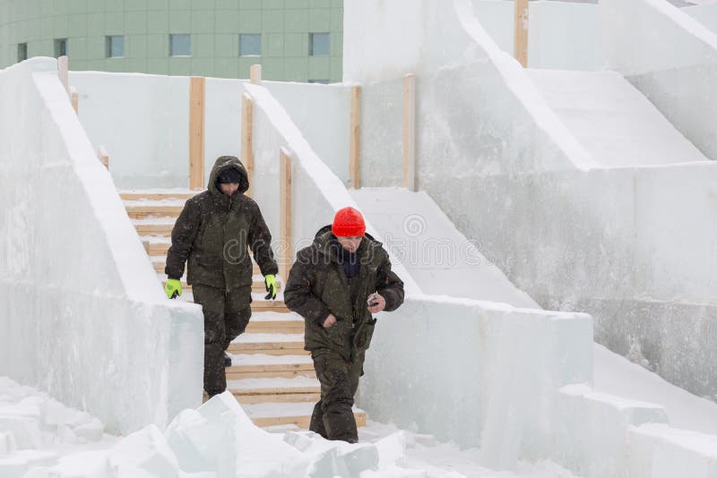 Two Workers at the Site of the Ice Camp Stock Photo - Image of ...