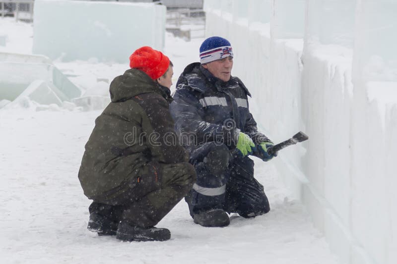 Two Workers at the Site of the Ice Camp Stock Photo - Image of panel ...