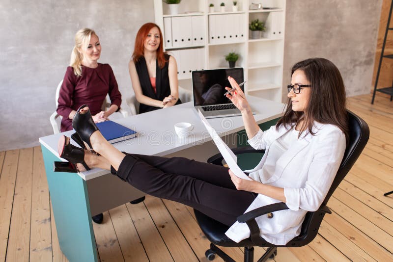 Two Workers Sits in Cabinet of Their Boss and Talk with Her Stock Photo ...