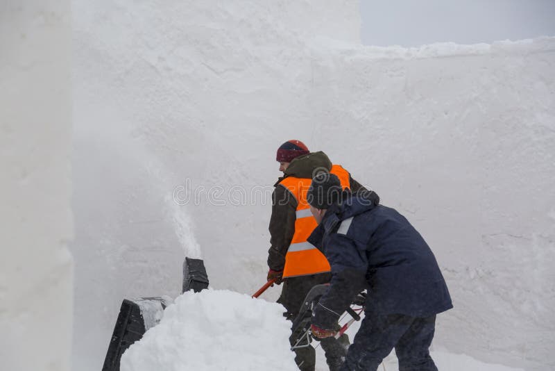 Two Workers in a Snowstorm at Snow Removal Stock Photo - Image of ...