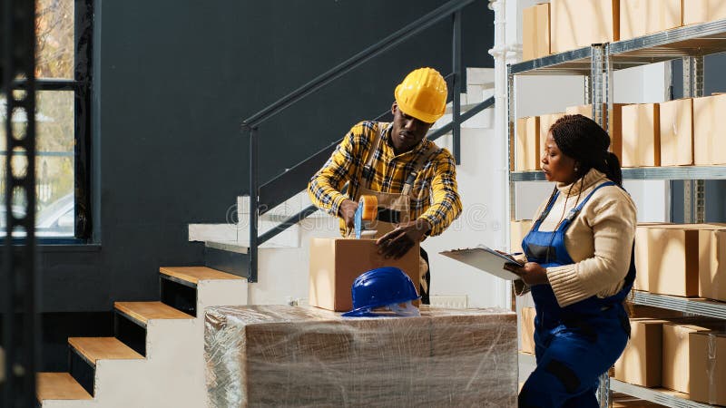 Two Workers Stacking Boxes and Working on Logistics Stock Image - Image ...