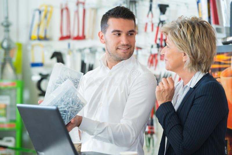 Two Workers Talking after Sales Service Stock Photo - Image of profit ...