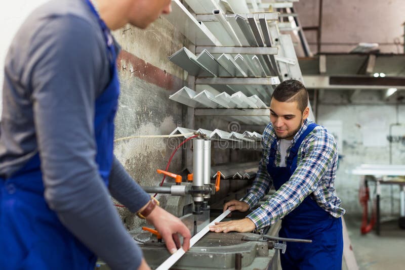 Two Workers Working on a Machine Stock Photo - Image of polymer, model ...