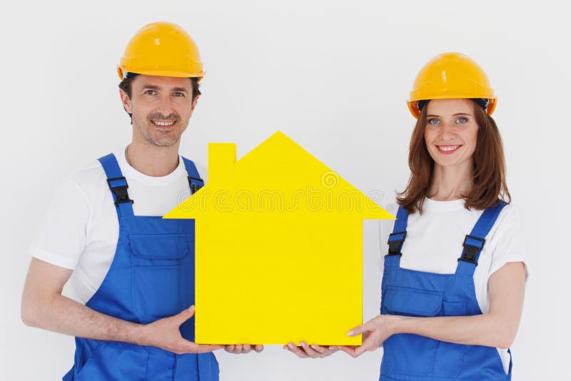 Two Workmen Holding House Symbol Stock Image - Image of workmen, team ...