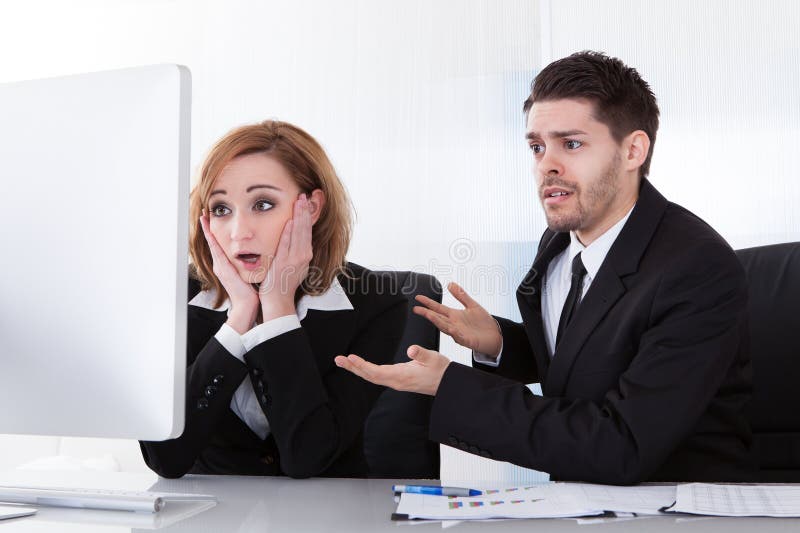 Two Worried Business Partners Looking Stock Photo - Image of ...