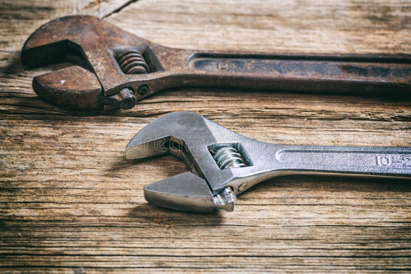 Two Wrenches on Wooden Background Stock Photo - Image of macro, concept ...