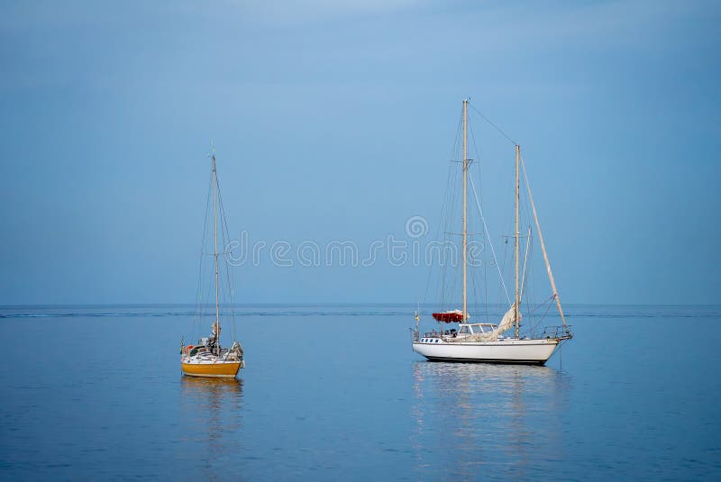 Two yachts stock image. Image of sailboat, nature, lagoon - 317415477
