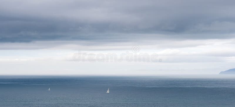 Two Yachts with White Sails on Cloudy Evening Stock Photo - Image of ...