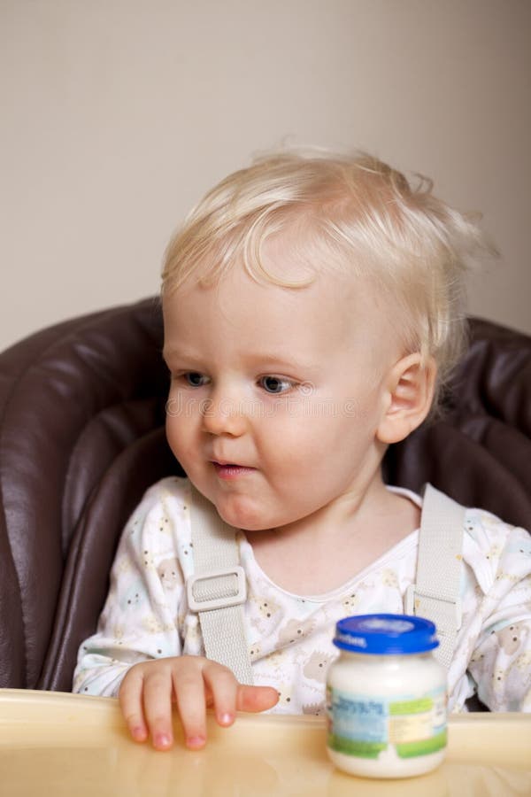 Two Year Baby Boy Sitting at the Dinner Table Stock Photo - Image of ...