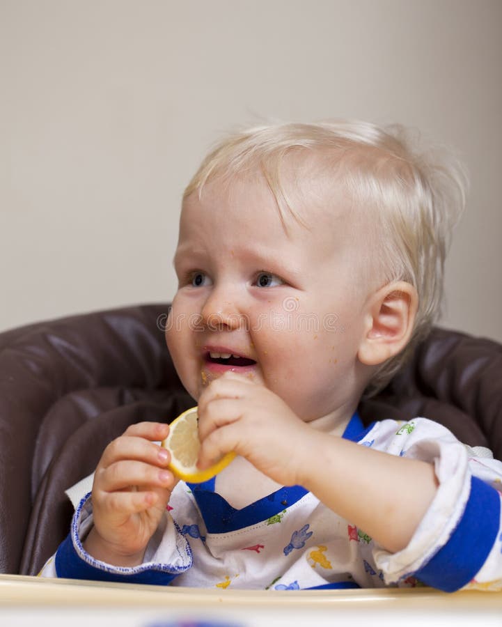 Two Year Baby Boy Sitting at the Dinner Table Stock Photo - Image of ...