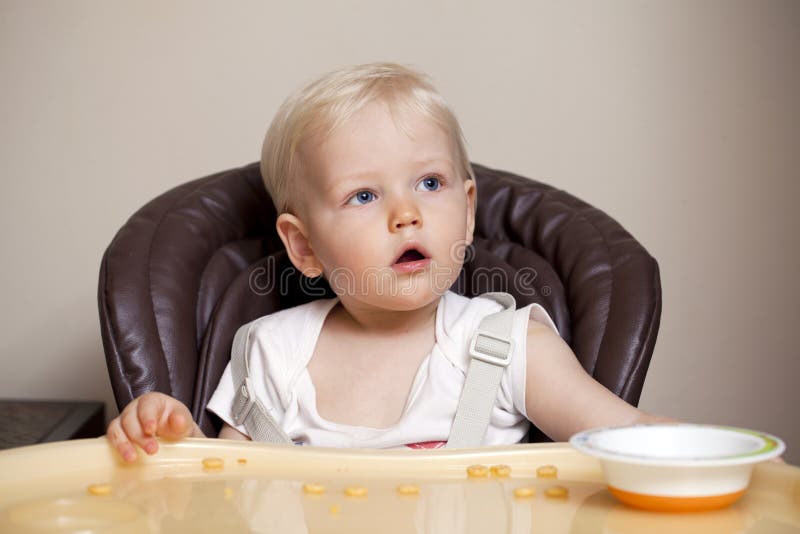 Two Year Baby Boy Sitting at the Dinner Table Stock Photo - Image of ...