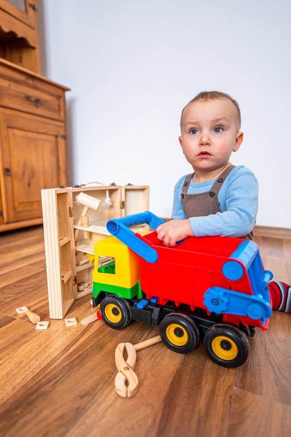 A Two-year-old Boy Playing Car Mechanic Stock Image - Image of build ...