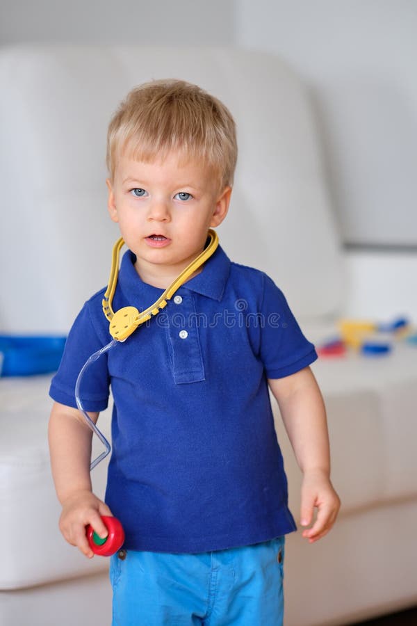 Two Year Old Boy Playing Doctor Stock Image - Image of blond ...