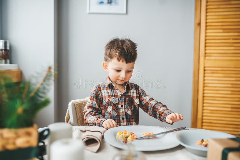 Child Boy with Plate of Tasty Paste in Kitchen Stock Photo - Image of ...