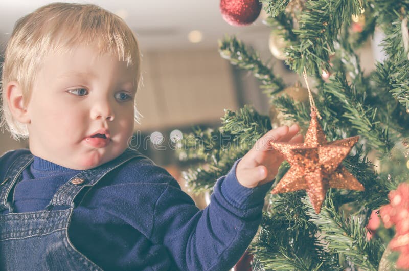 Two Years Old Boy Decorating the Christmas Tree Stock Photo - Image of ...