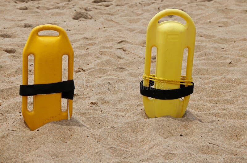 Two Yellow Boogie Boards on the Beach for Use by Life Savers Stock ...