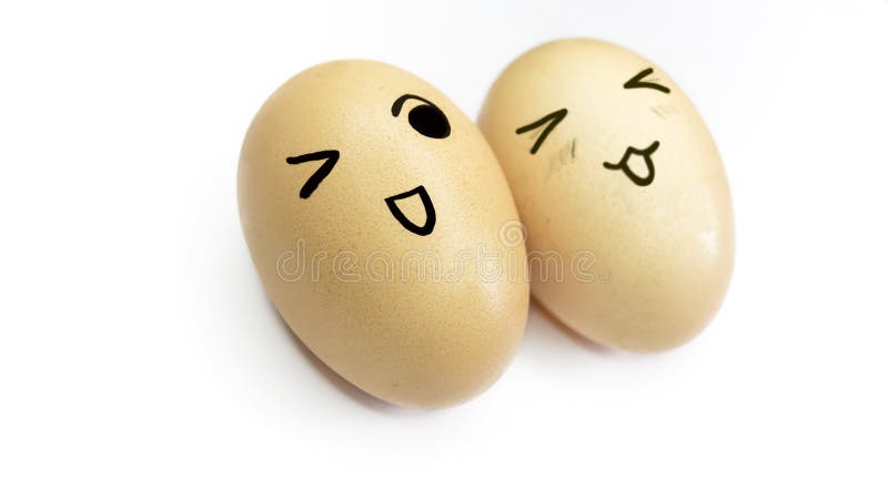 Two Yellow Eggs with Painted Emoticons on a White Background. Eggs with ...