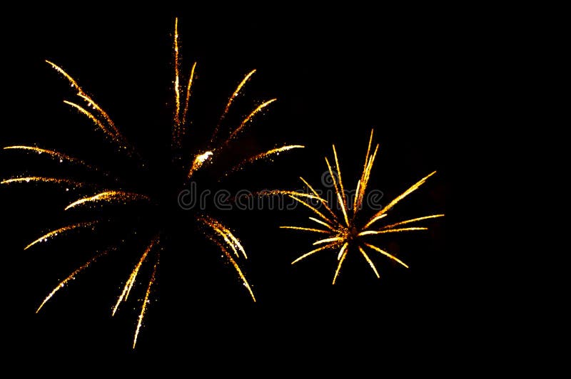 Two Yellow Fireworks in the Shape Flowers Stock Photo - Image of yellow ...